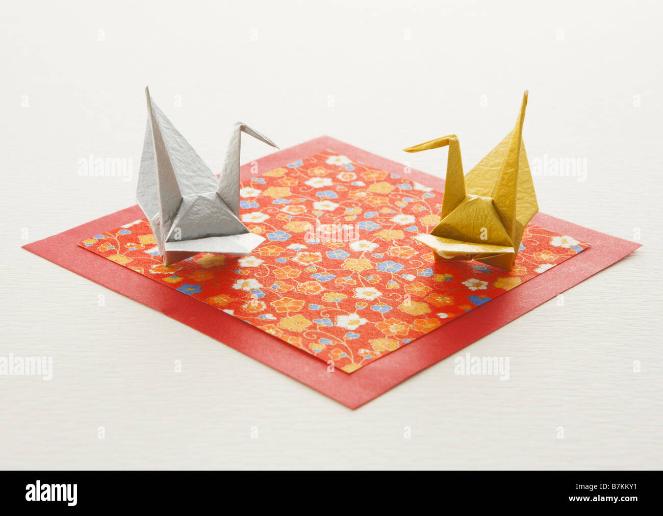 Folded paper crane Stock Photo - Alamy