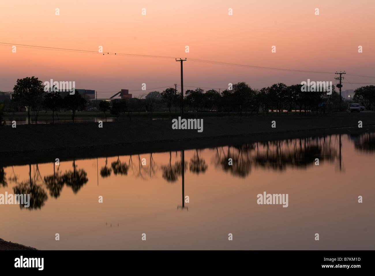 Telegraph poles sunset Stock Photo - Alamy