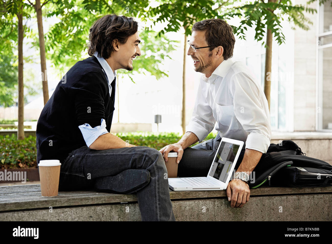 Colleagues having coffee Stock Photo - Alamy