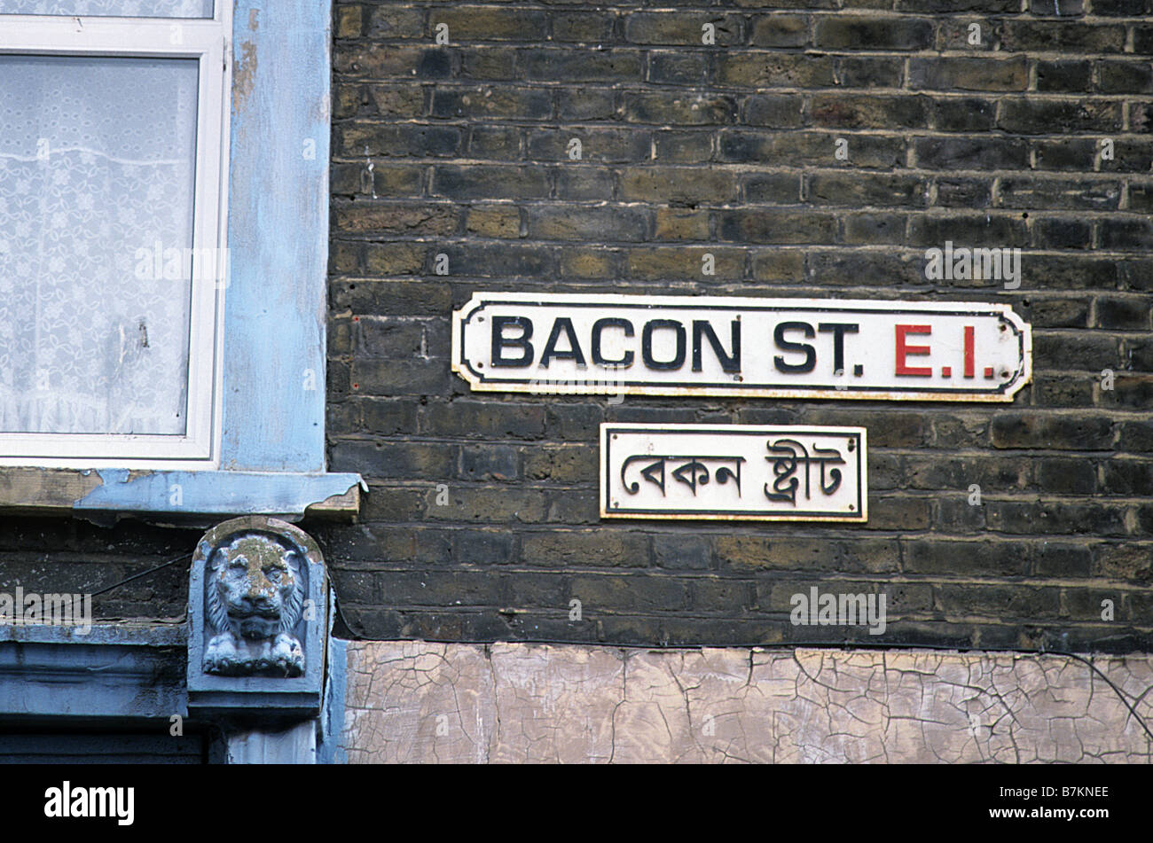 London,bilingual, street name plate, Bacon Street Stock Photo - Alamy