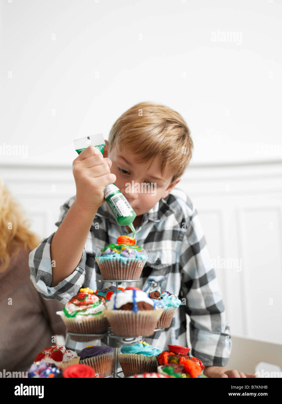 Boy making Cupcakes Stock Photo - Alamy