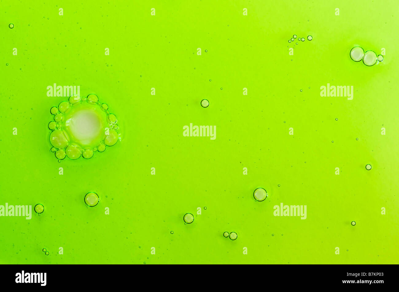 Abstract green gel liquid background with bubbles Stock Photo - Alamy