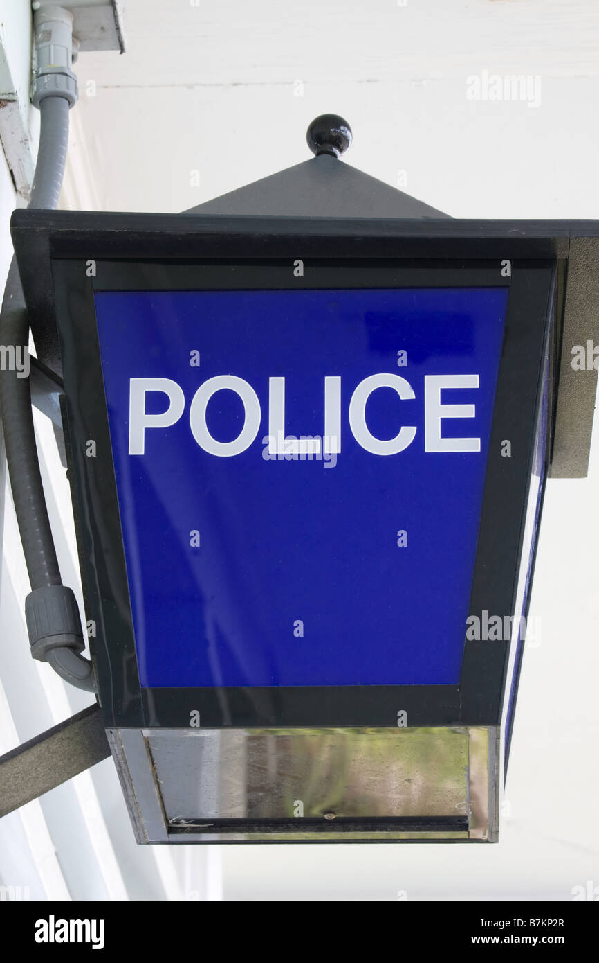 traditional blue police sign light Stock Photo - Alamy