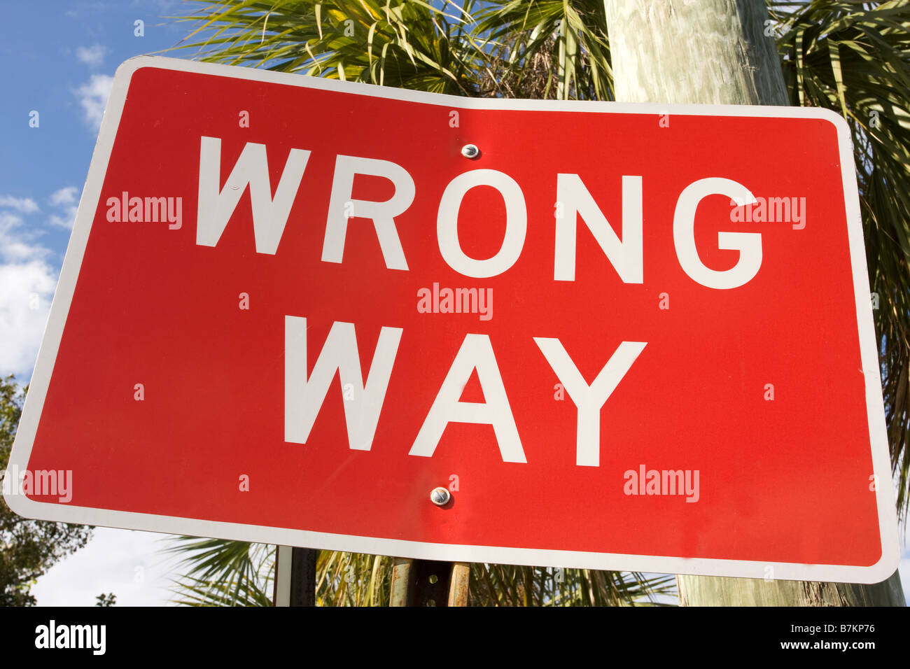 red road sign warning wrong way Stock Photo - Alamy
