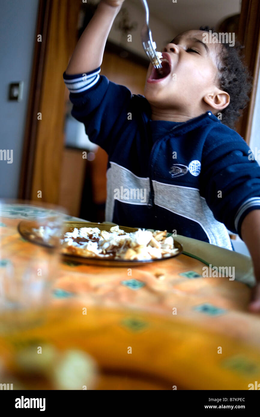 little boy eating food Stock Photo - Alamy