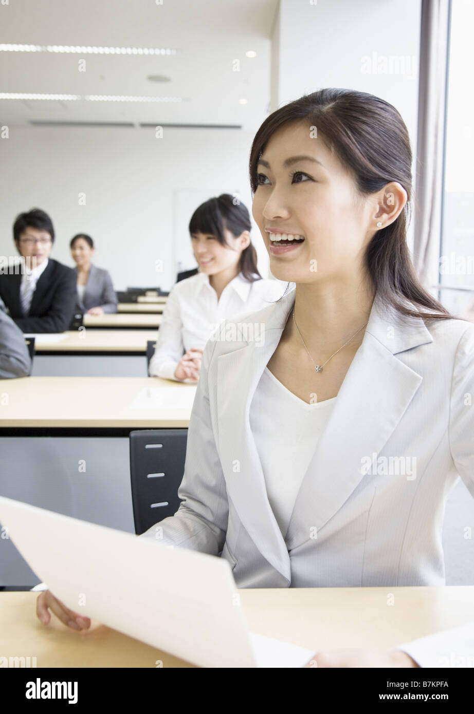 Businesswoman on the job training Stock Photo - Alamy