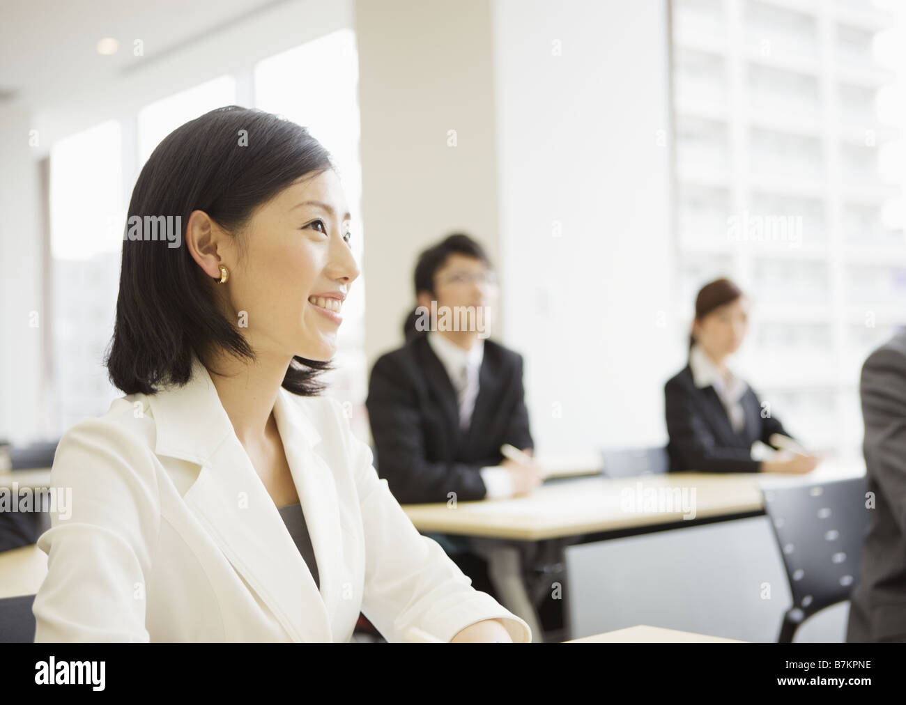 Businesswoman on the job training Stock Photo - Alamy