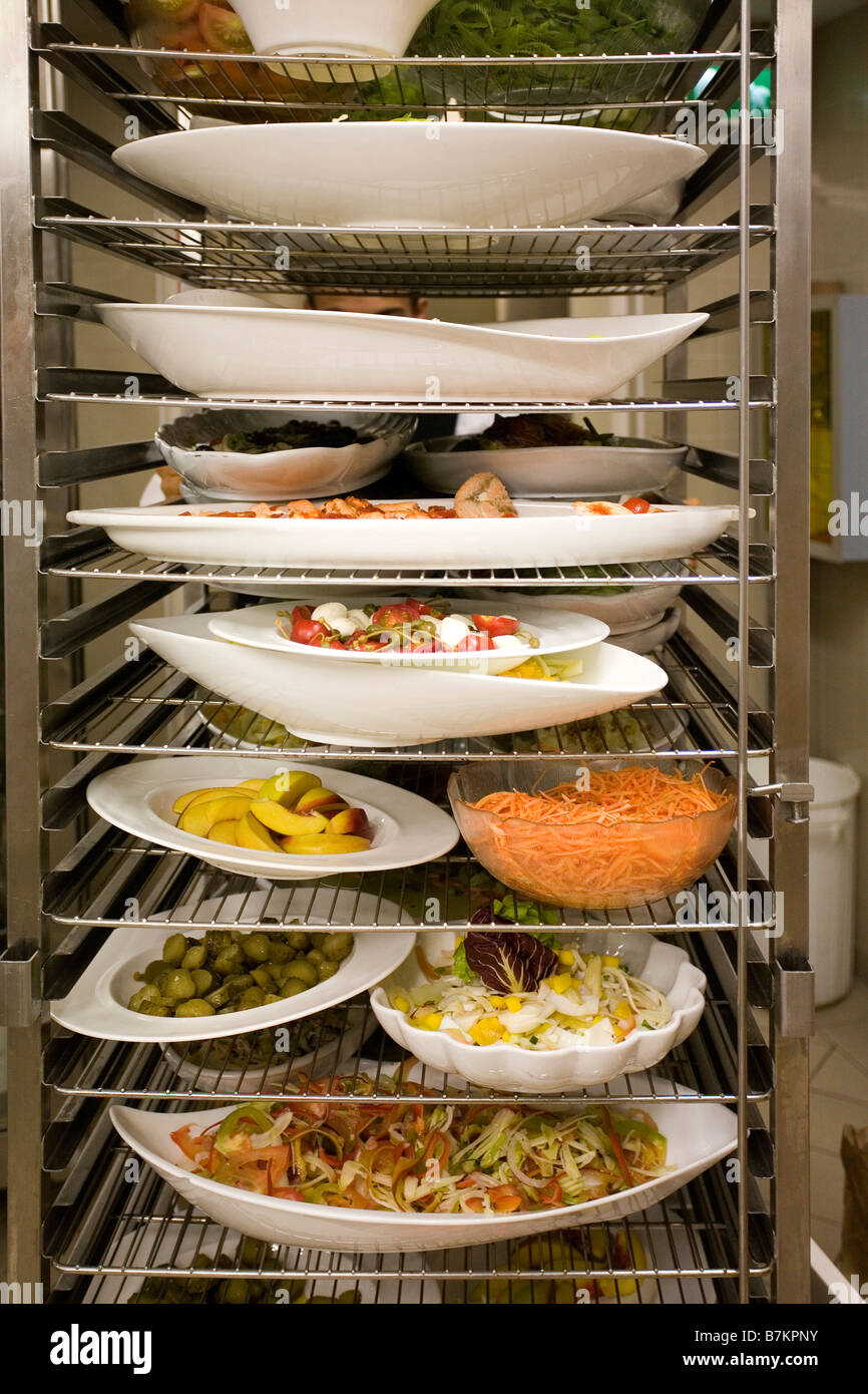 stacks of dishes on trolley Stock Photo - Alamy