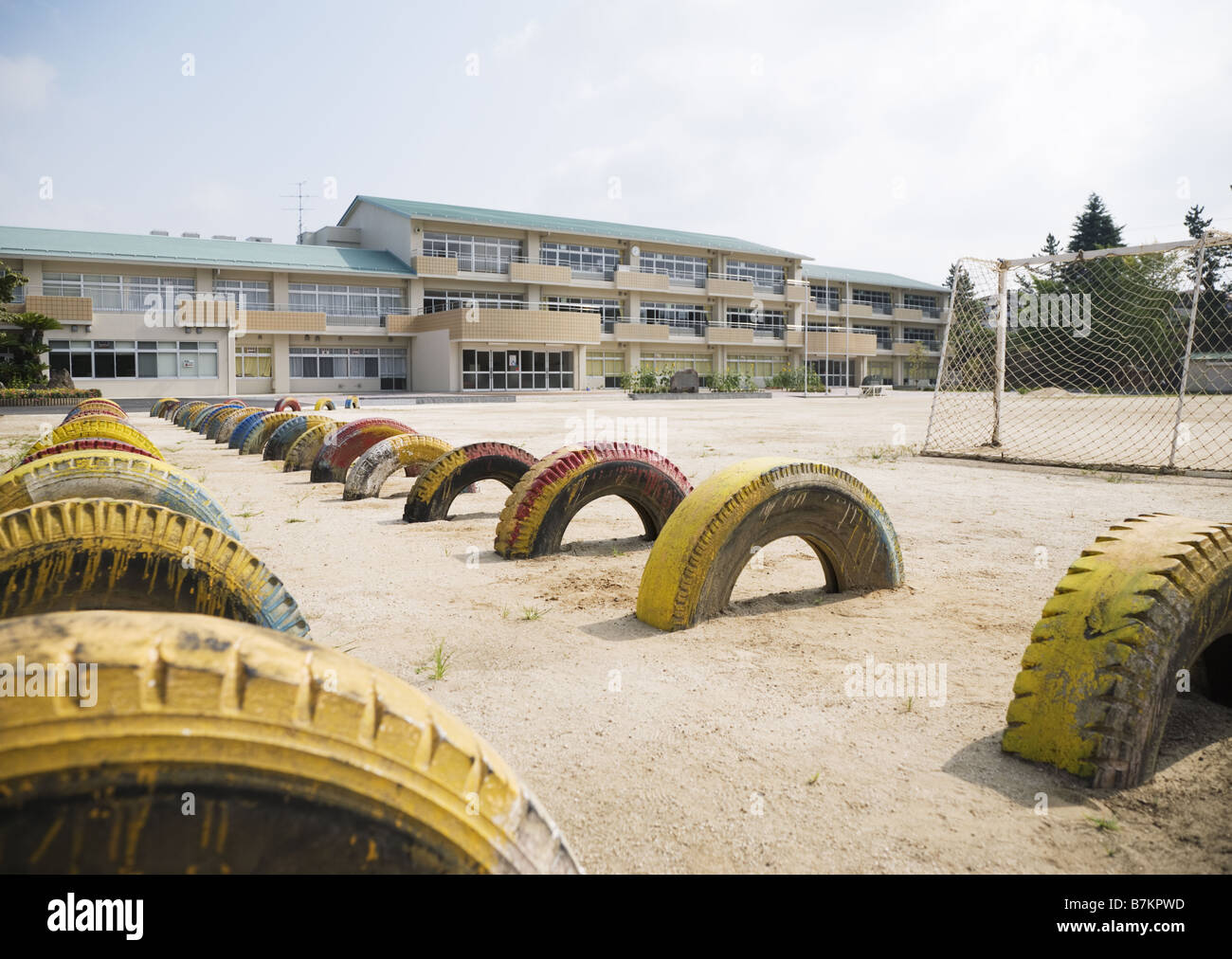 School building and schoolyard Stock Photo - Alamy
