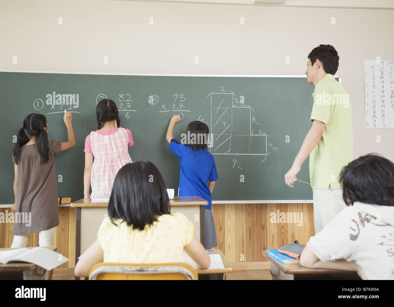Boy girl boys girls teacher man hi-res stock photography and images - Alamy