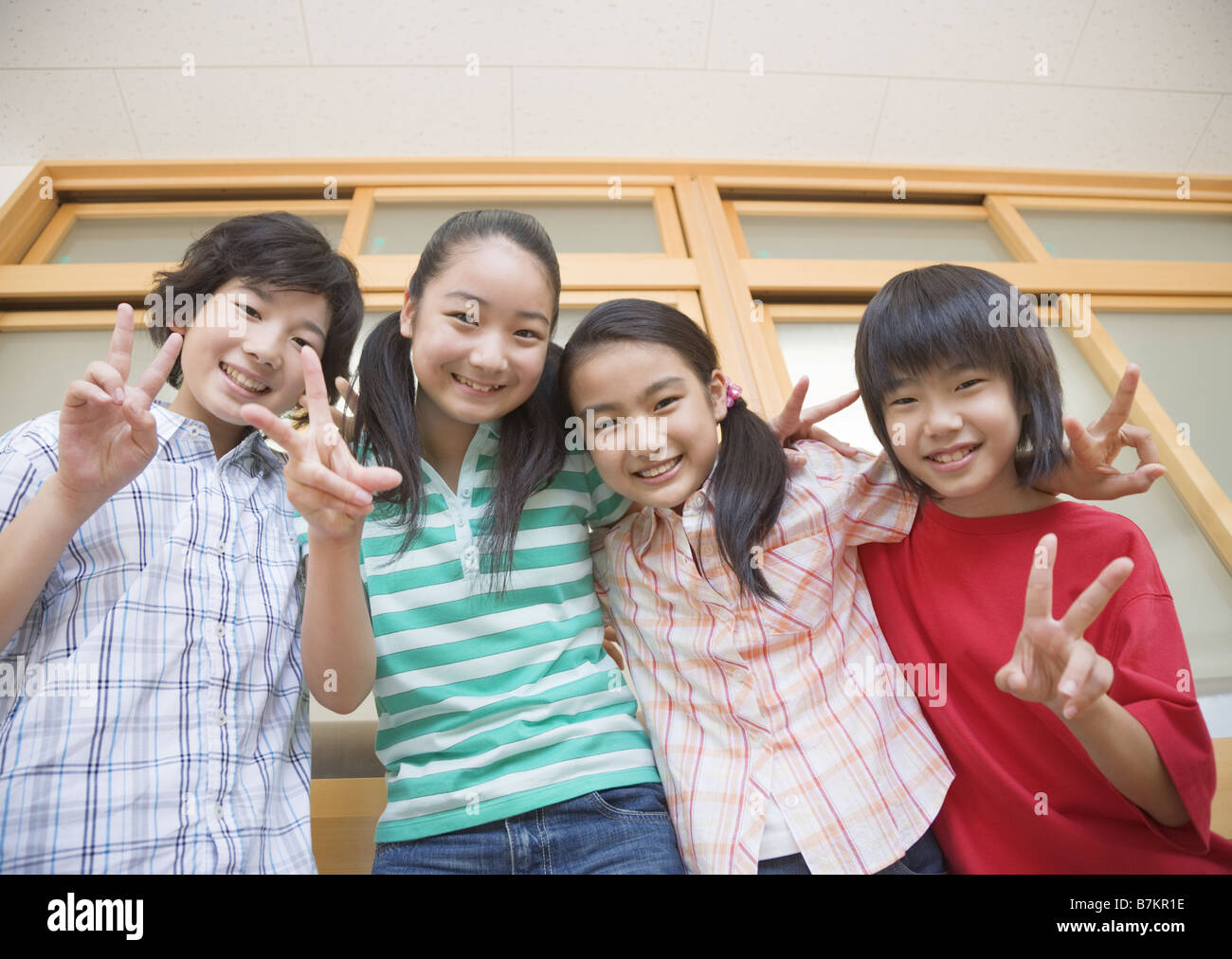 Elementary school students smiling Stock Photo - Alamy