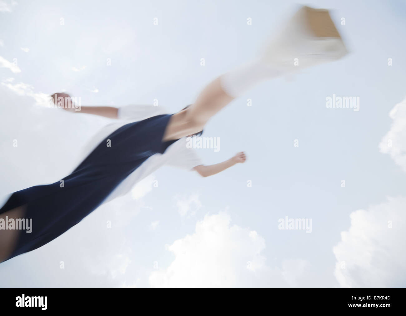 Elementary school student jumping Stock Photo - Alamy