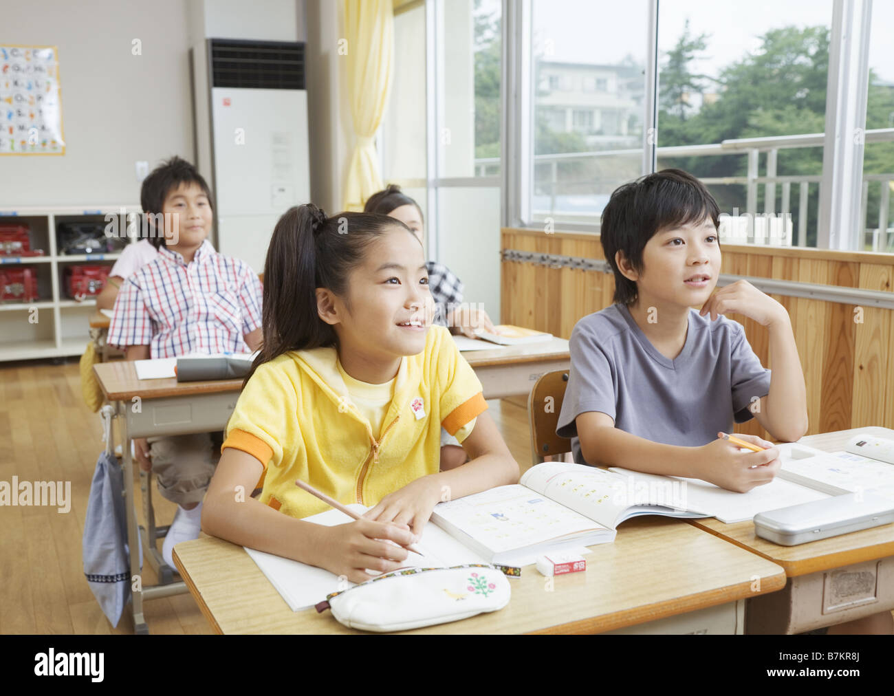 Elementary school students at school Stock Photo - Alamy