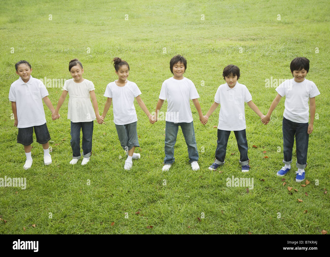 Elementary school students standing in a line Stock Photo - Alamy