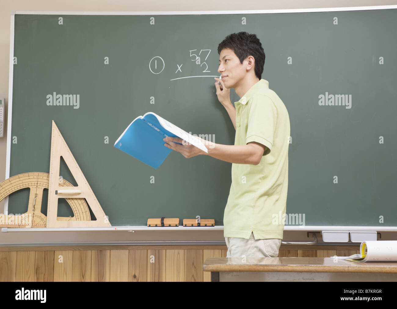 Teacher giving a math class Stock Photo - Alamy