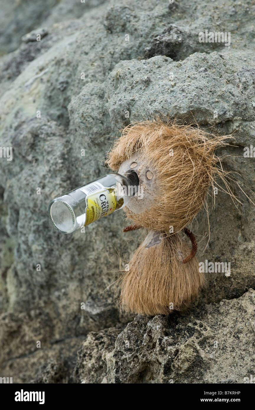 A coconut man has a drink Stock Photo - Alamy