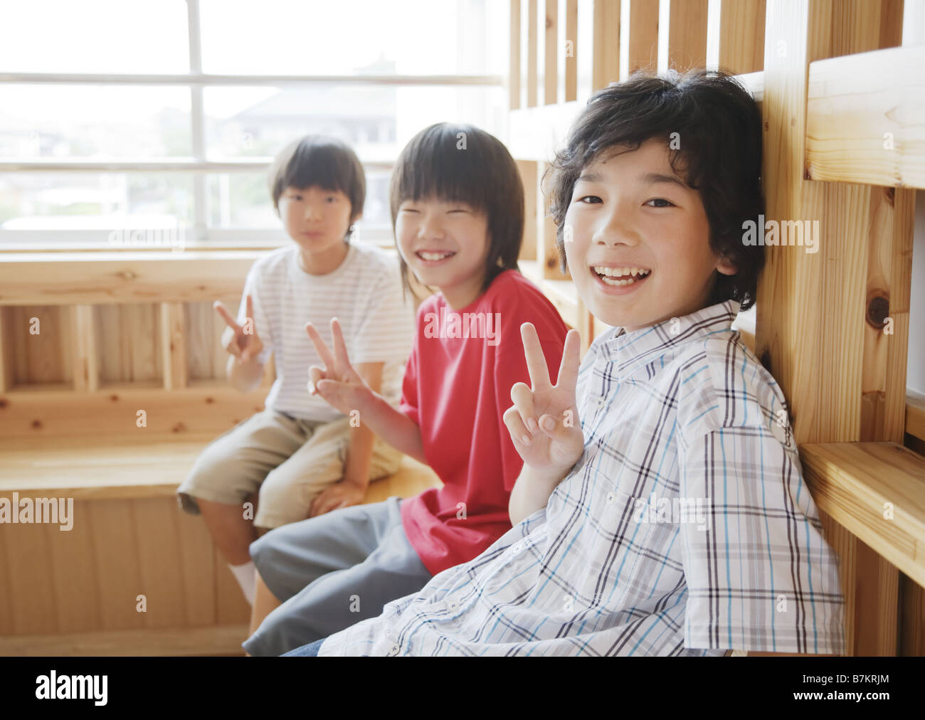 Elementary school students smiling Stock Photo - Alamy
