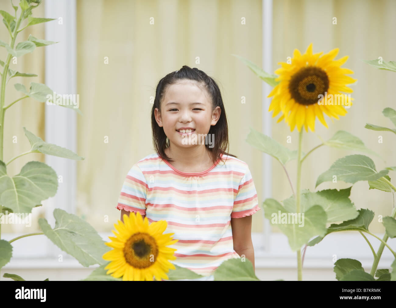 Elementary school girl smiling Stock Photo - Alamy