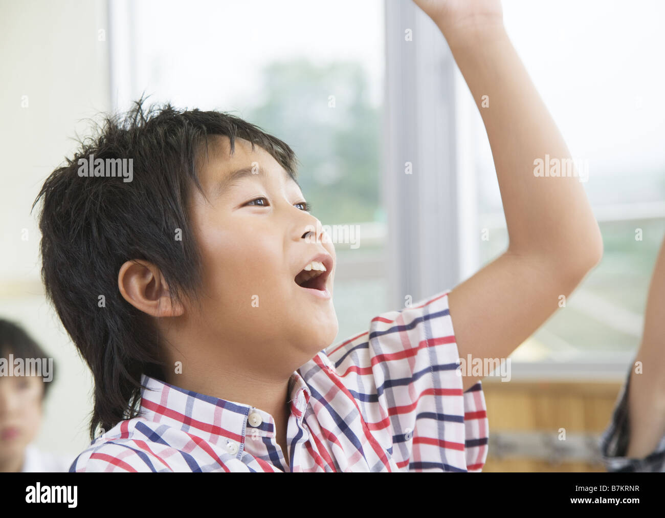 Elementary school boy at school Stock Photo - Alamy