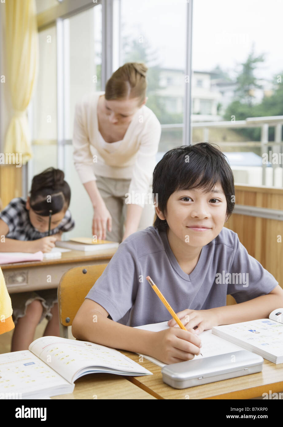 Elementary school students at school Stock Photo - Alamy