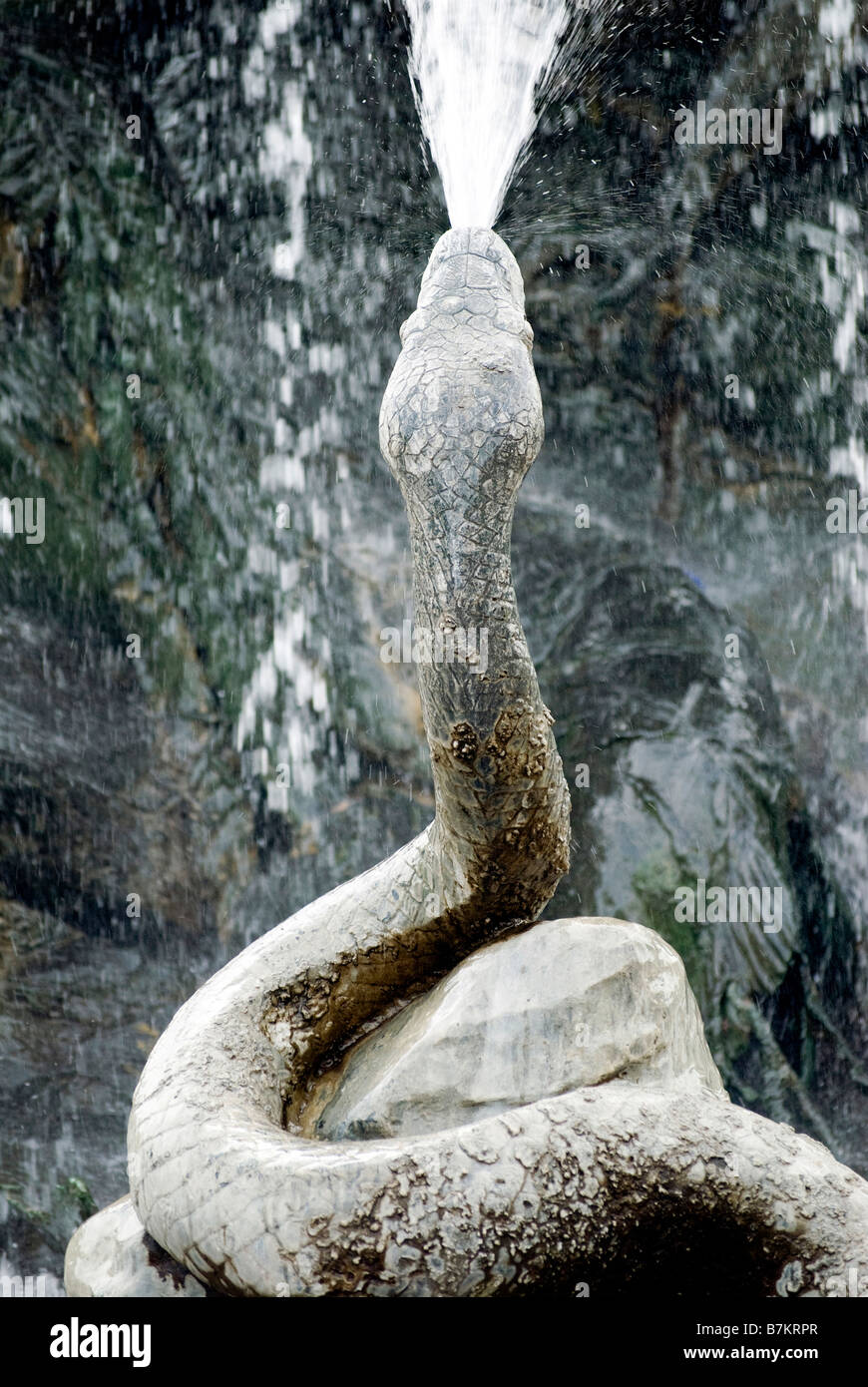 Germany, Berlin, Fountain with snake sculpture, close-up Stock Photo ...