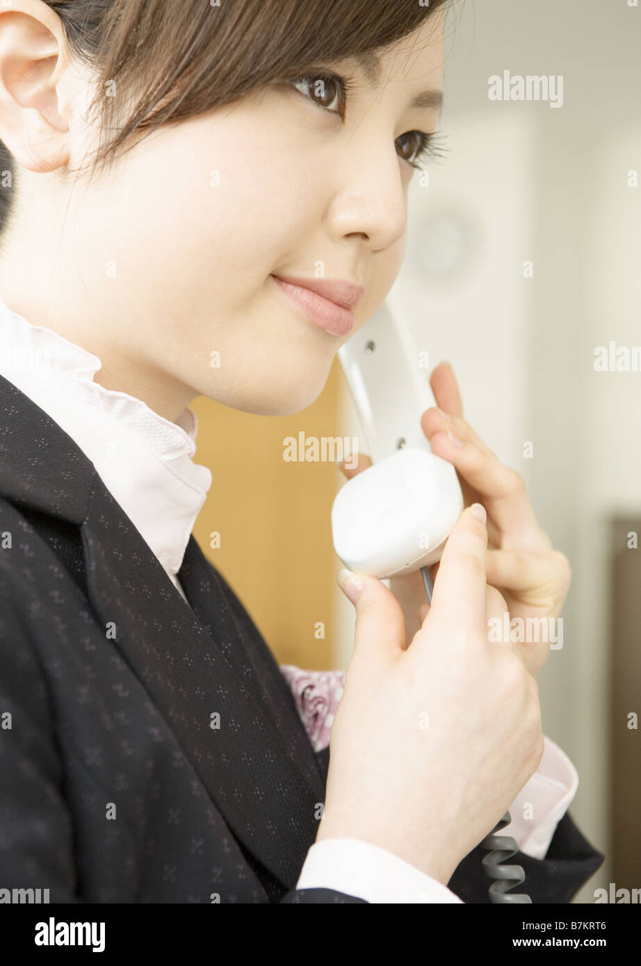 A secretary making a call Stock Photo - Alamy
