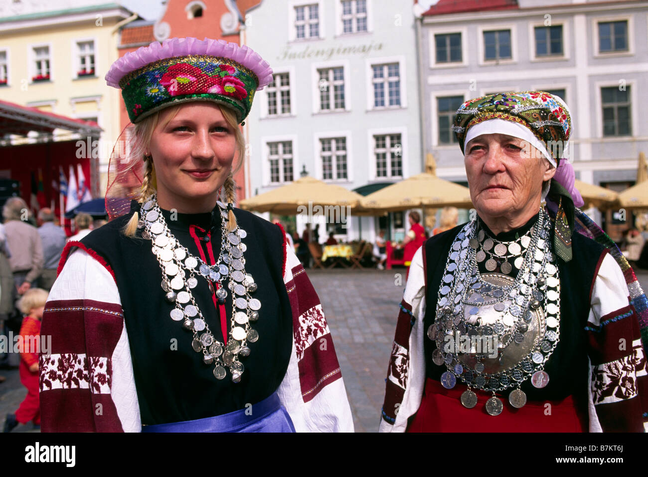Estonia, Tallinn, Raekoja Plats, women wearing traditional clothes ...