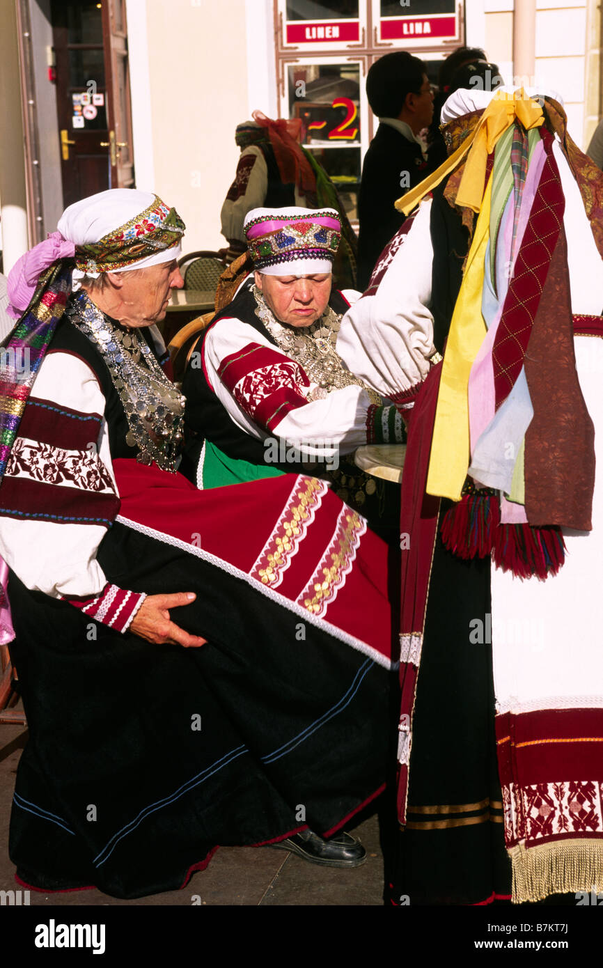 Estonia, Tallinn, Raekoja Plats, women wearing traditional clothes ...