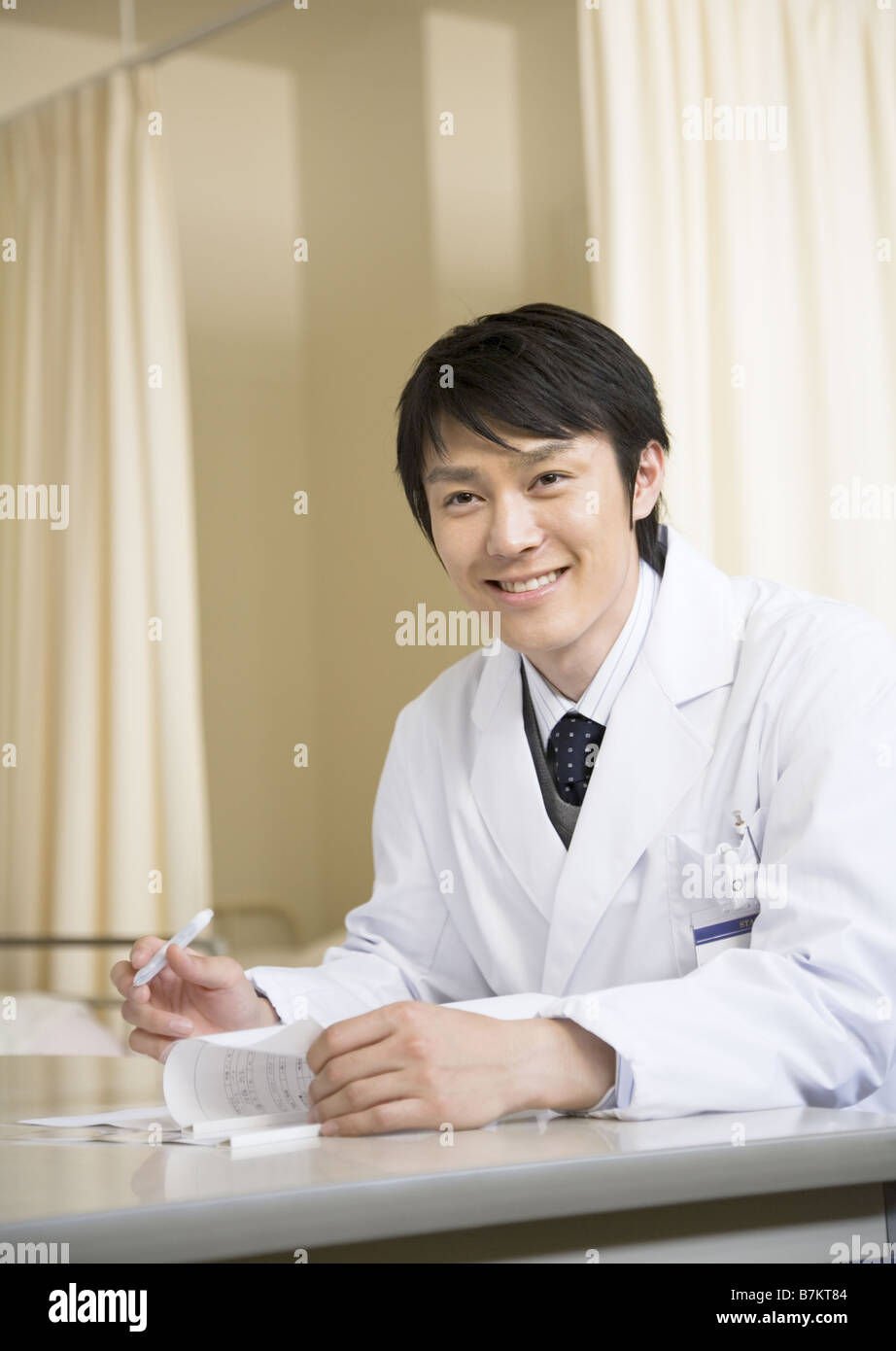 A smiling doctor Stock Photo - Alamy