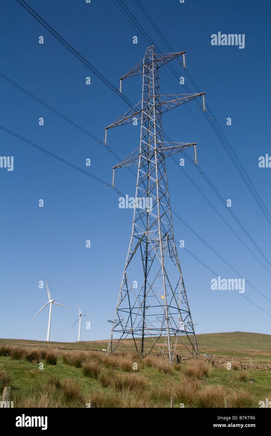 wind turbines and electricity pylons Stock Photo - Alamy