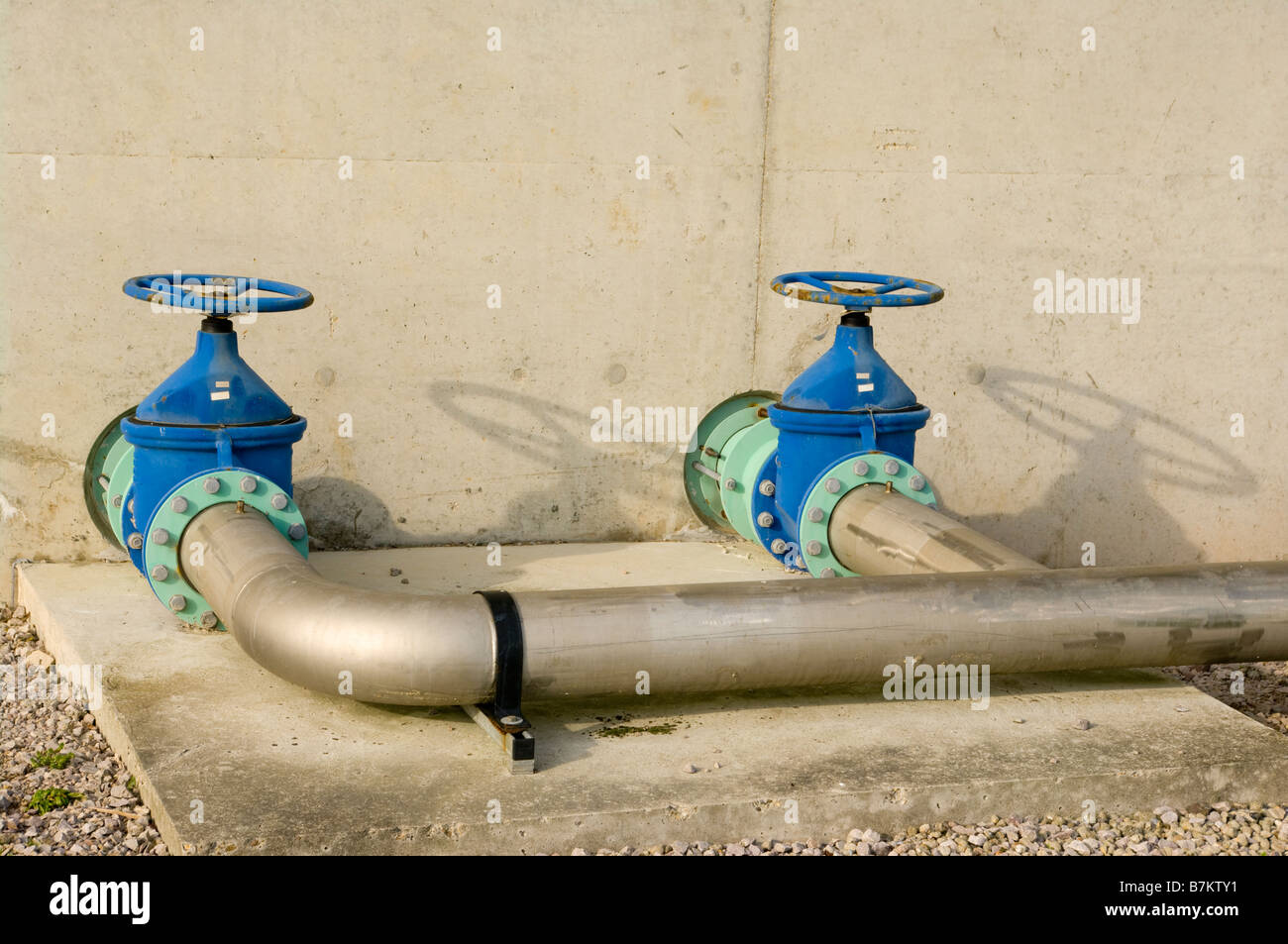 2 Manual Valves on Pipework Pipes Stock Photo - Alamy