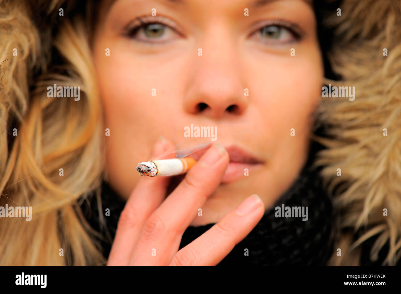 young woman smoking Stock Photo - Alamy