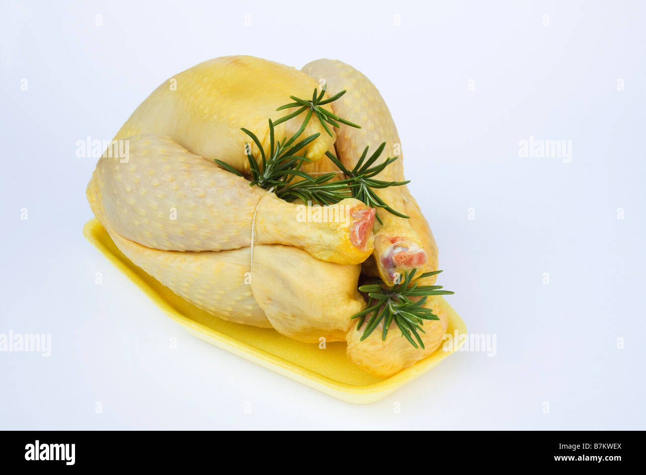 Raw chicken on plastic tray, close-up Stock Photo - Alamy