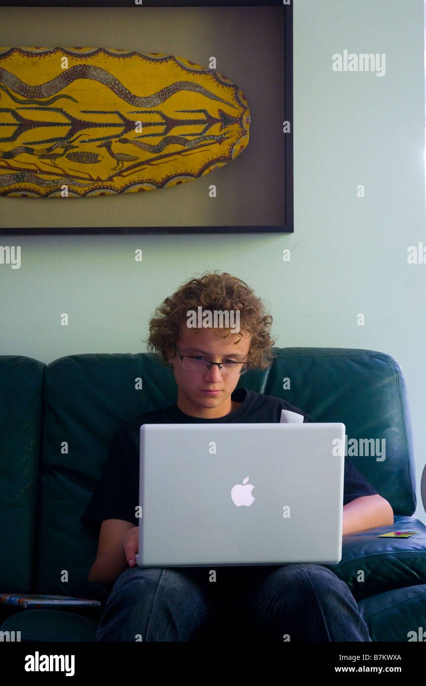 Teenager computing boy hi-res stock photography and images - Alamy