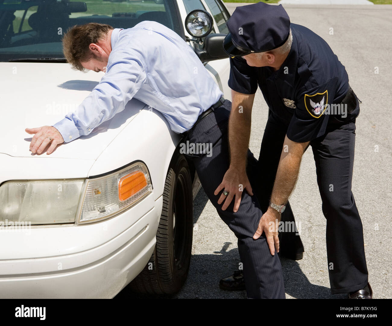 Pat down by police hi-res stock photography and images - Alamy