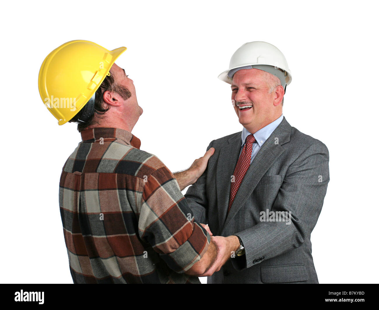 an engineer and a construction foreman sharing a joke together at work ...