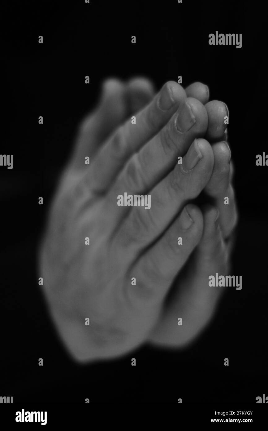 Pray prayer praying Black and White Stock Photos & Images - Alamy