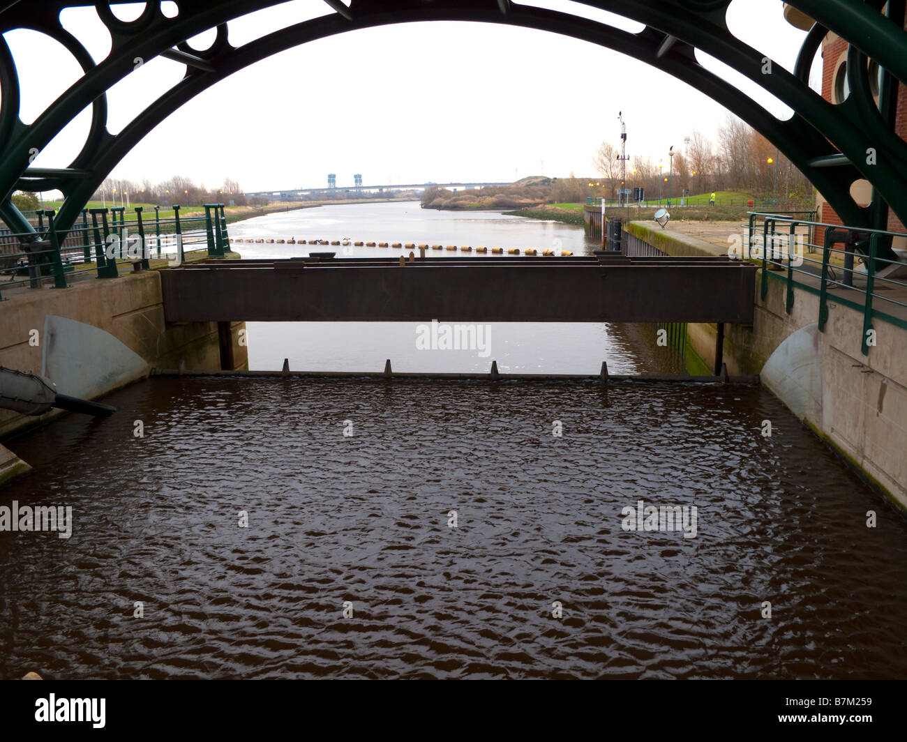 Tees barrage under bridge. View looking down river Stock Photo - Alamy