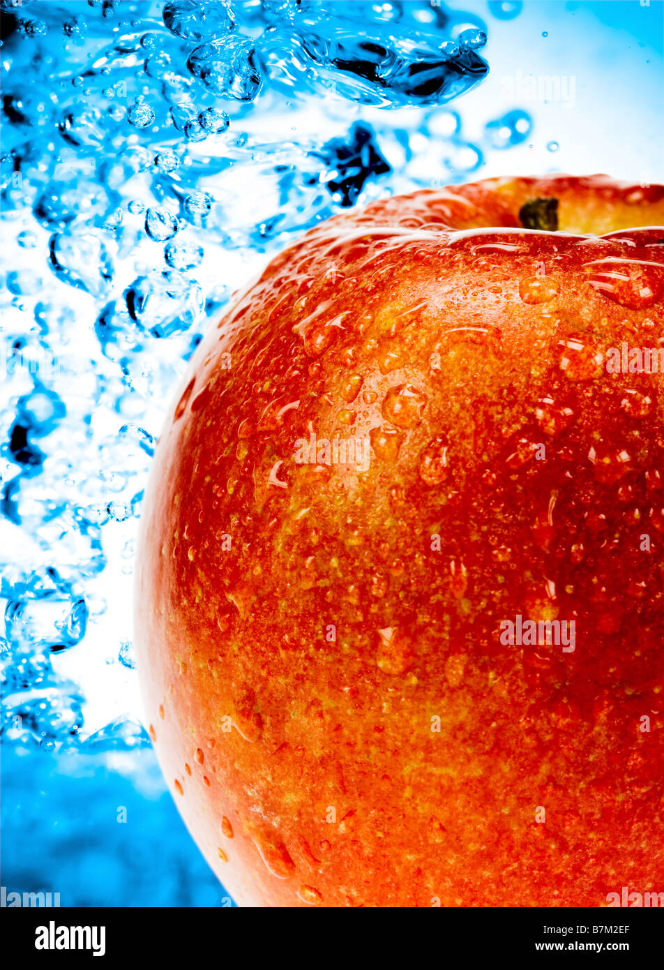fresh apple fruit with water splash Stock Photo - Alamy