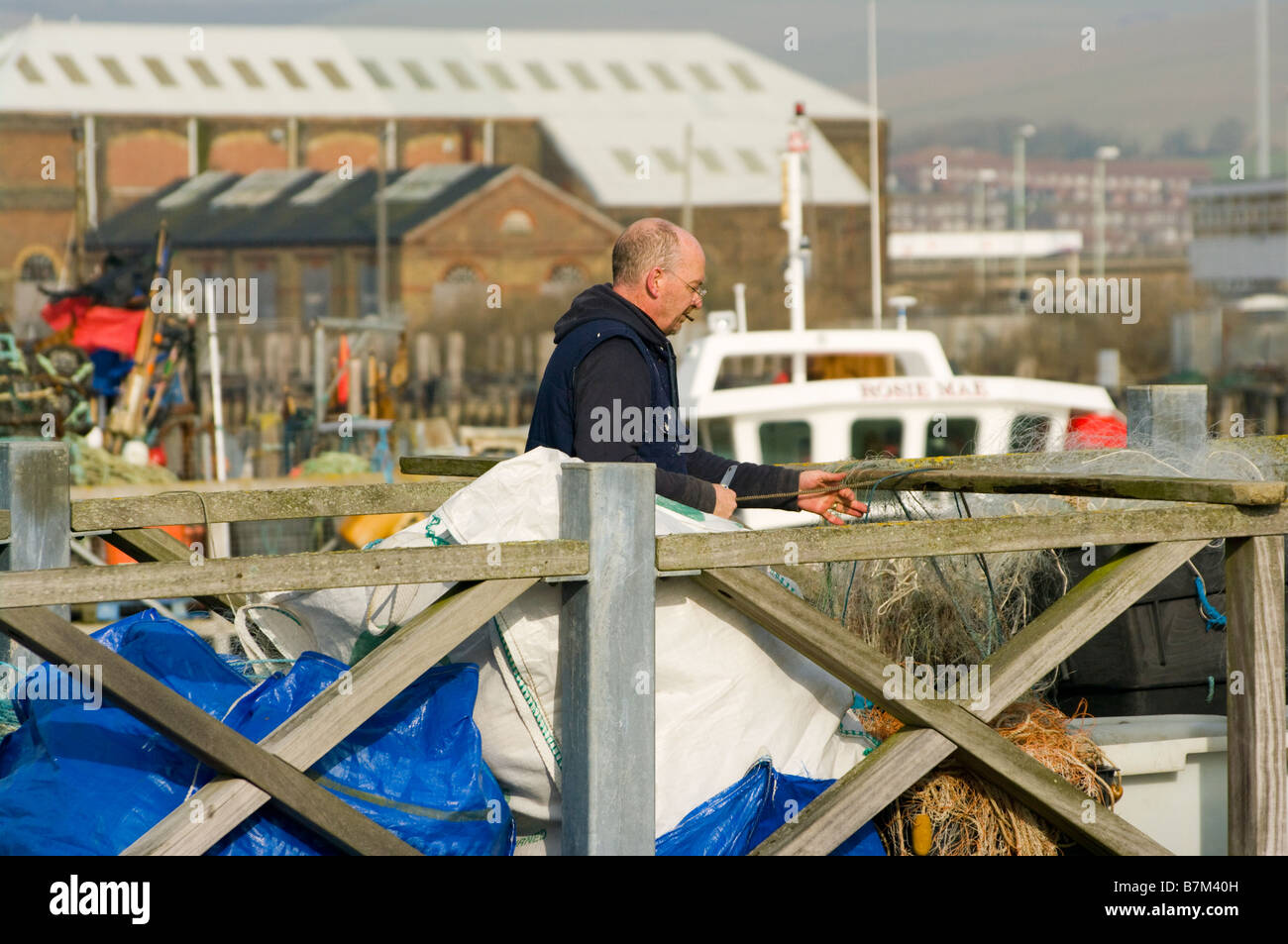 Fisherman carrying fishing net hi-res stock photography and images - Alamy