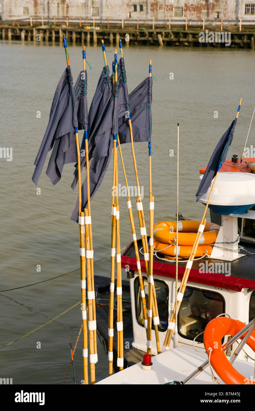 several lot of Commercial Fishing Marker Flags Stock Photo - Alamy