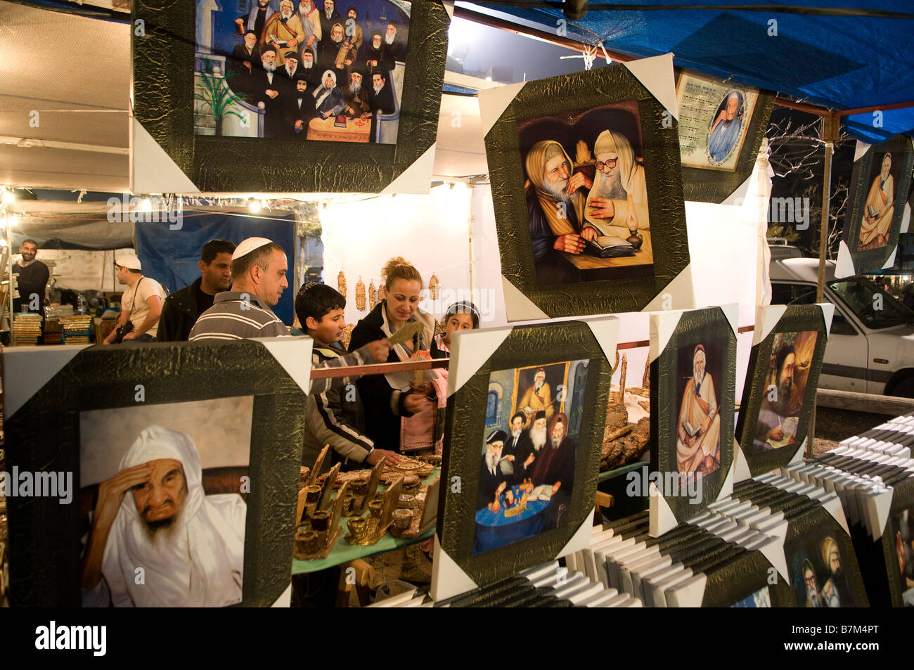 Sephardic Jews buying variety of Jewish religious objects at the ...
