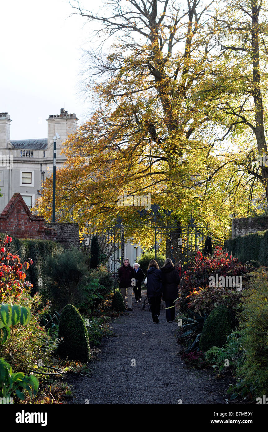 people walking walk stroll strolling in the walled garden farmleigh ...