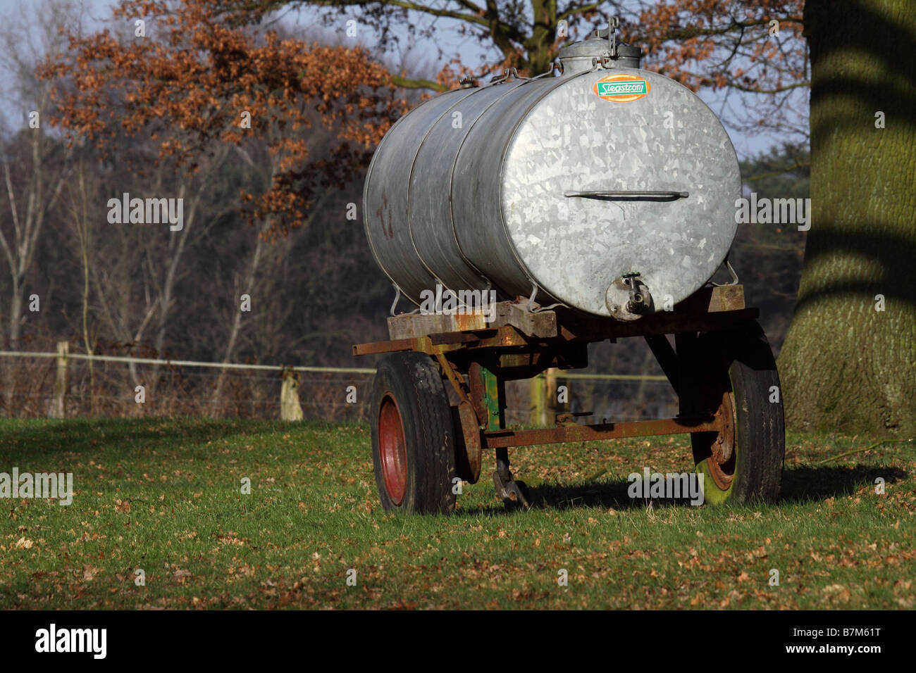 Water bowser in farm field Stock Photo - Alamy
