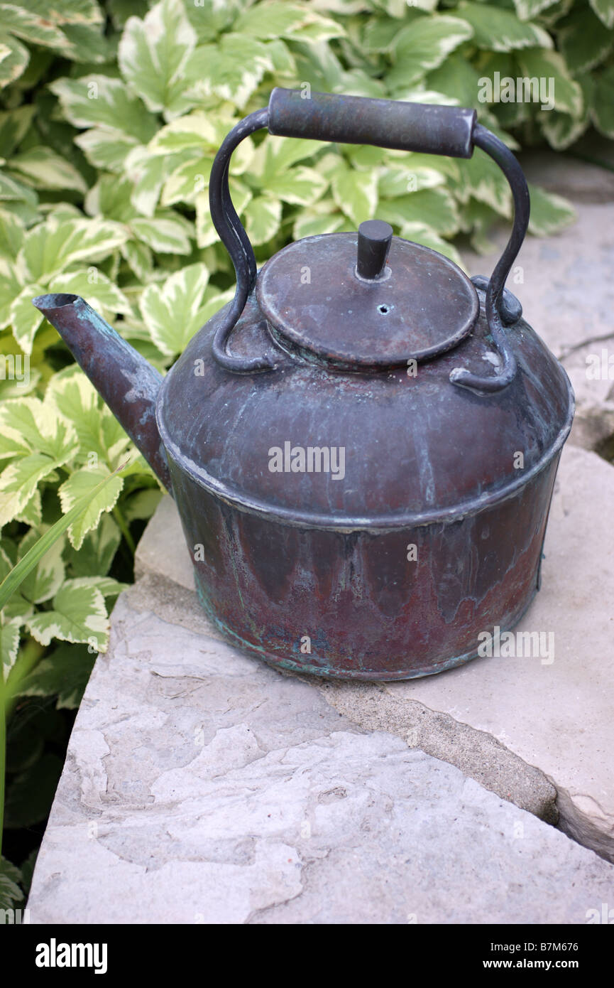 Garden copper kettle Stock Photo - Alamy