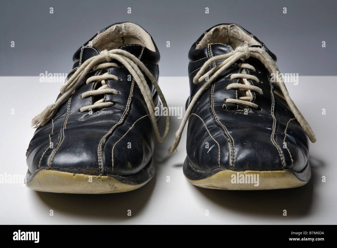 Worn out shoes hi-res stock photography and images - Alamy