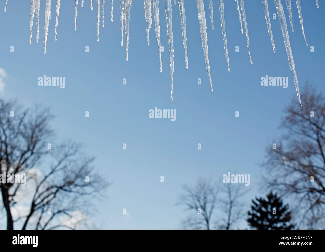 Icicle hanging from a rooftop hi-res stock photography and images - Alamy