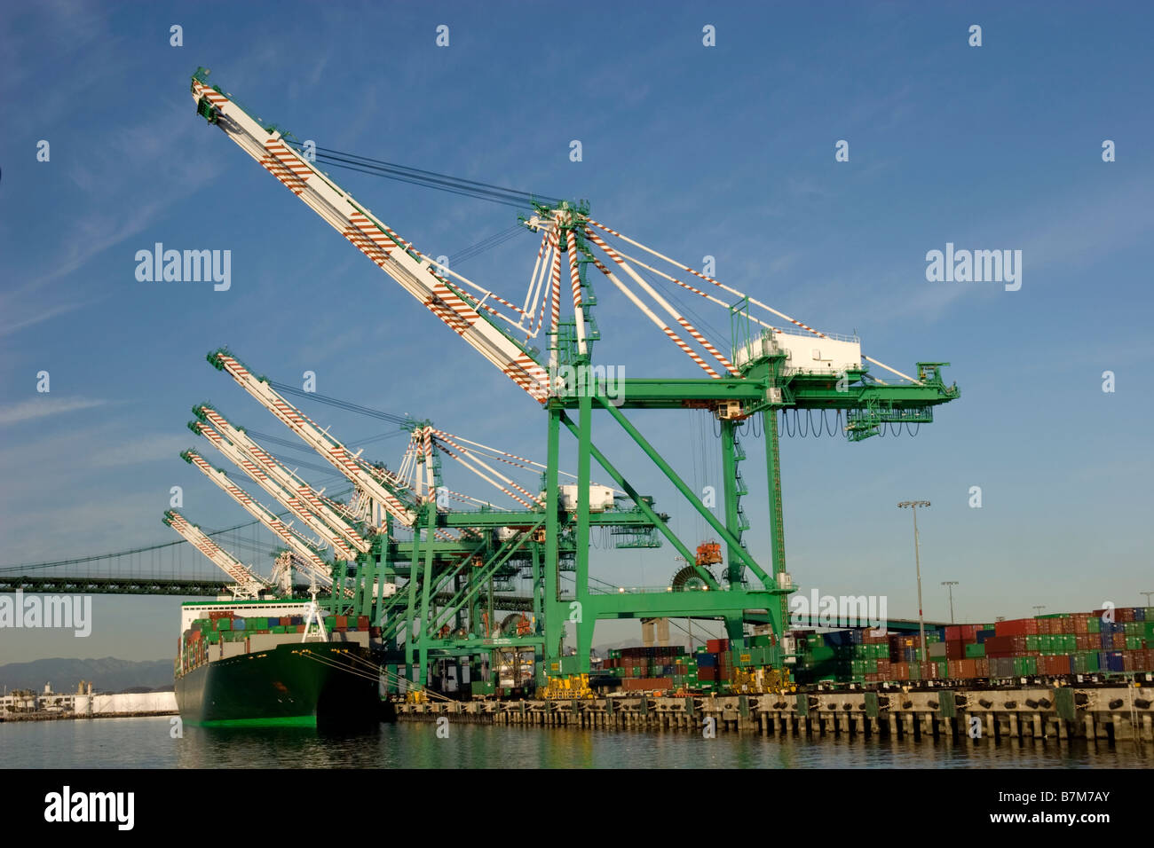 Cargo being loaded on a large container ship in the Port of Los Angeles ...