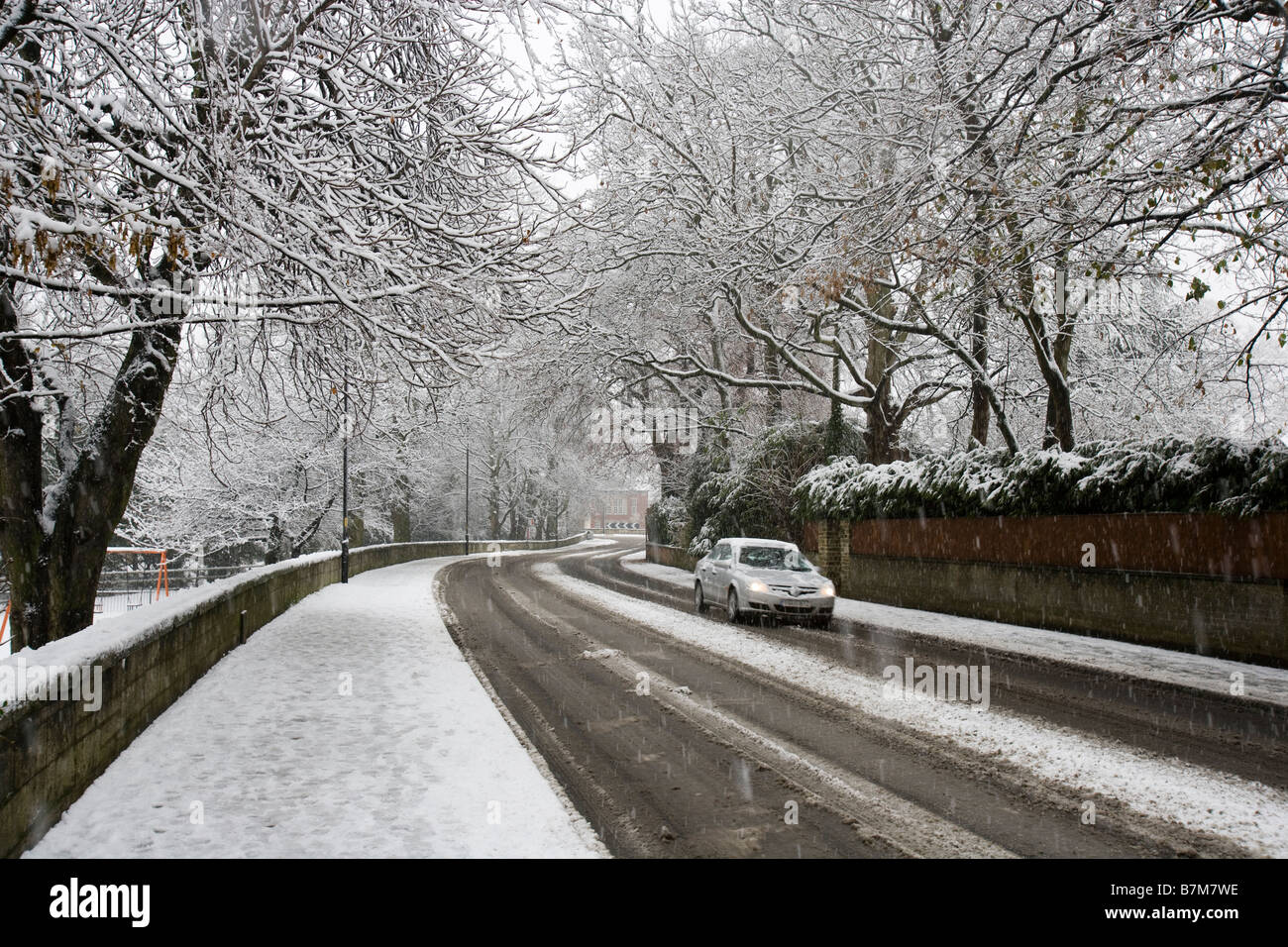 Winter driving snow snowing drive cars hi-res stock photography and ...