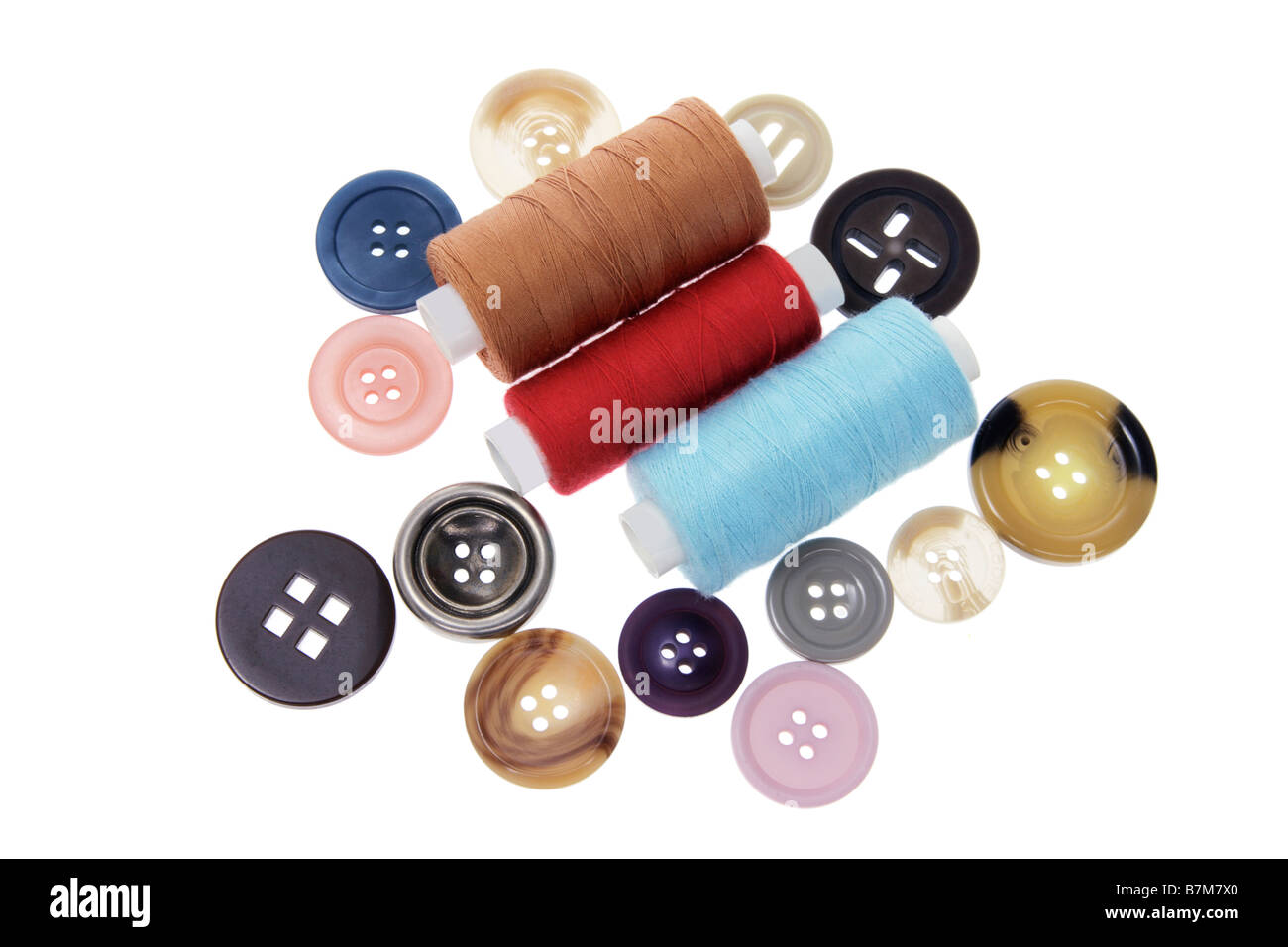 Buttons and Spools of Thread Stock Photo - Alamy